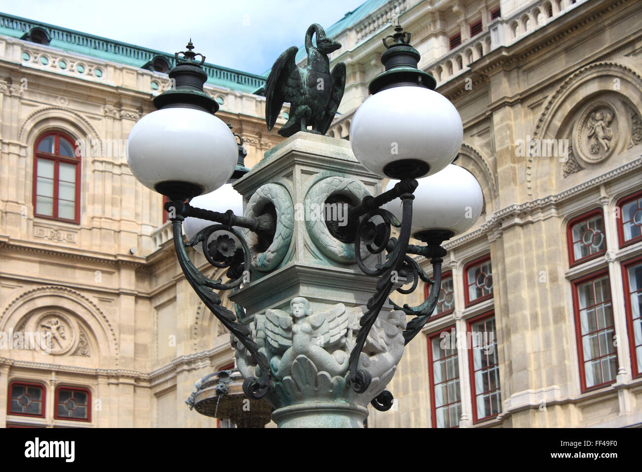 decorations on the lamp in front of the Vienna Opera, Austria Stock ...