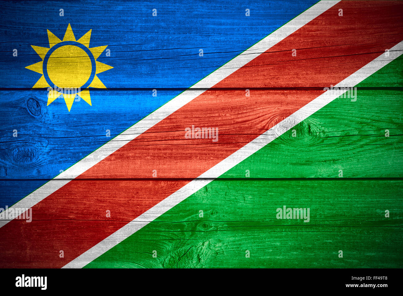 flag of Namibia or Namibia banner on wooden background Stock Photo - Alamy