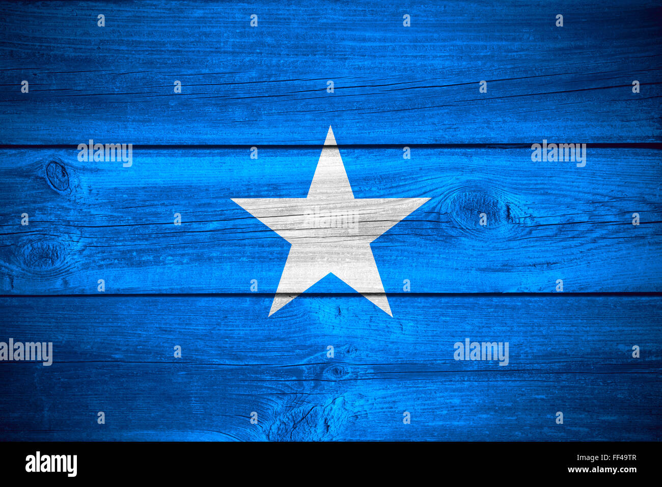 flag of Somalia or Somalian banner on wooden background Stock Photo - Alamy