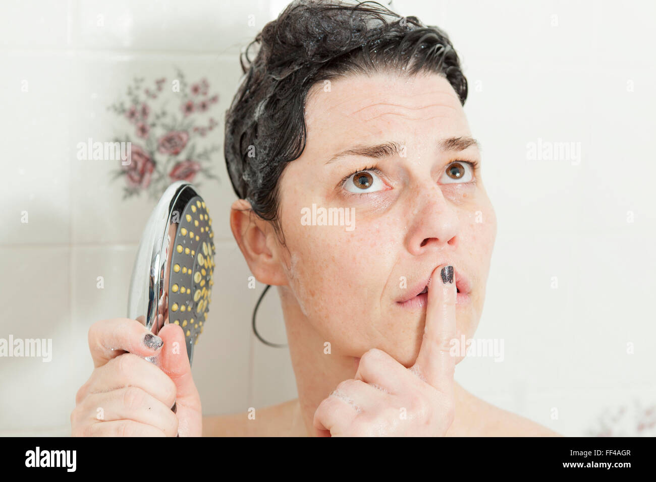 Shower woman. washing shoulder showering in Stock Photo - Alamy