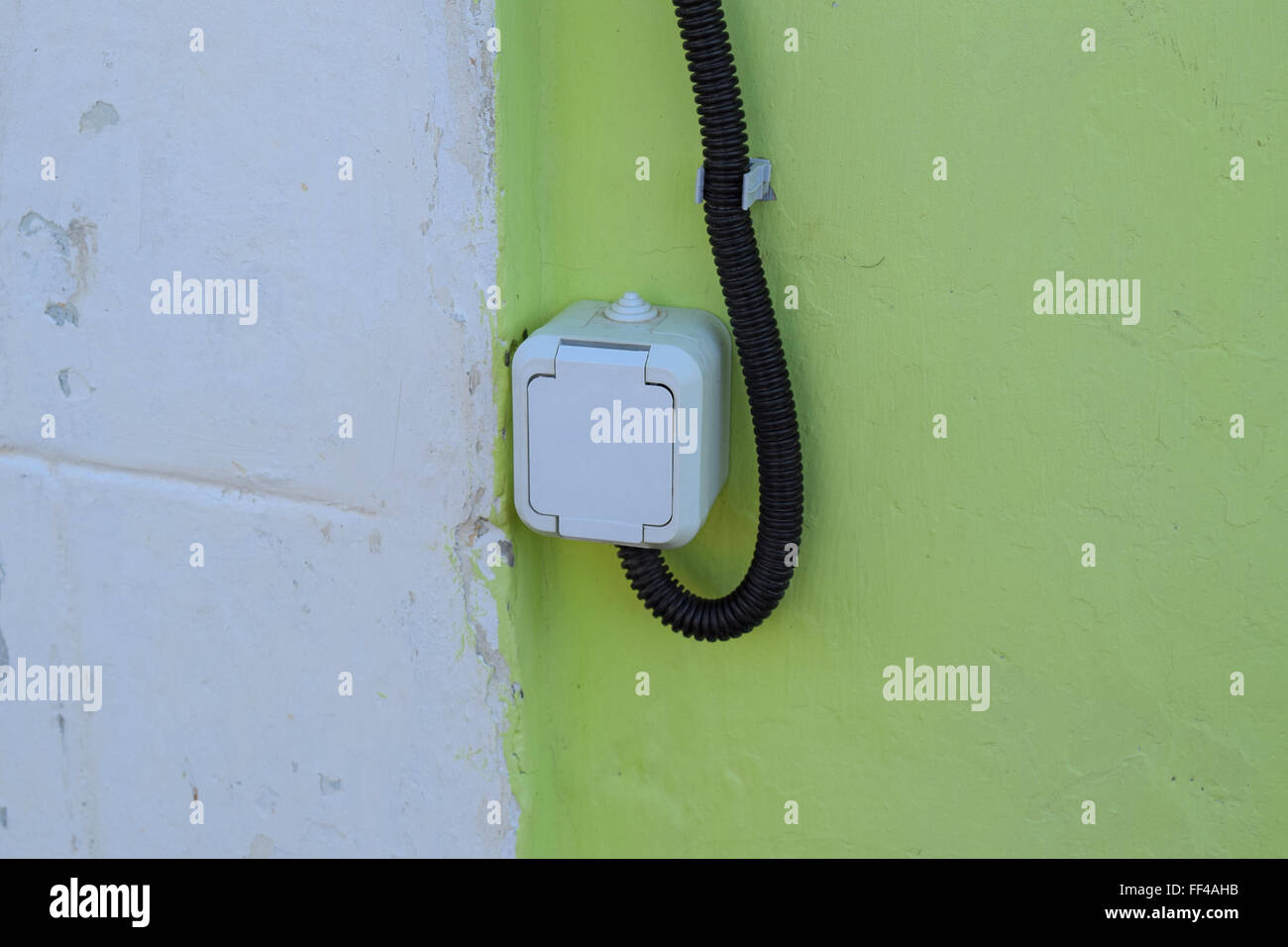 The socket in the open air. The socket on the wall Stock Photo - Alamy