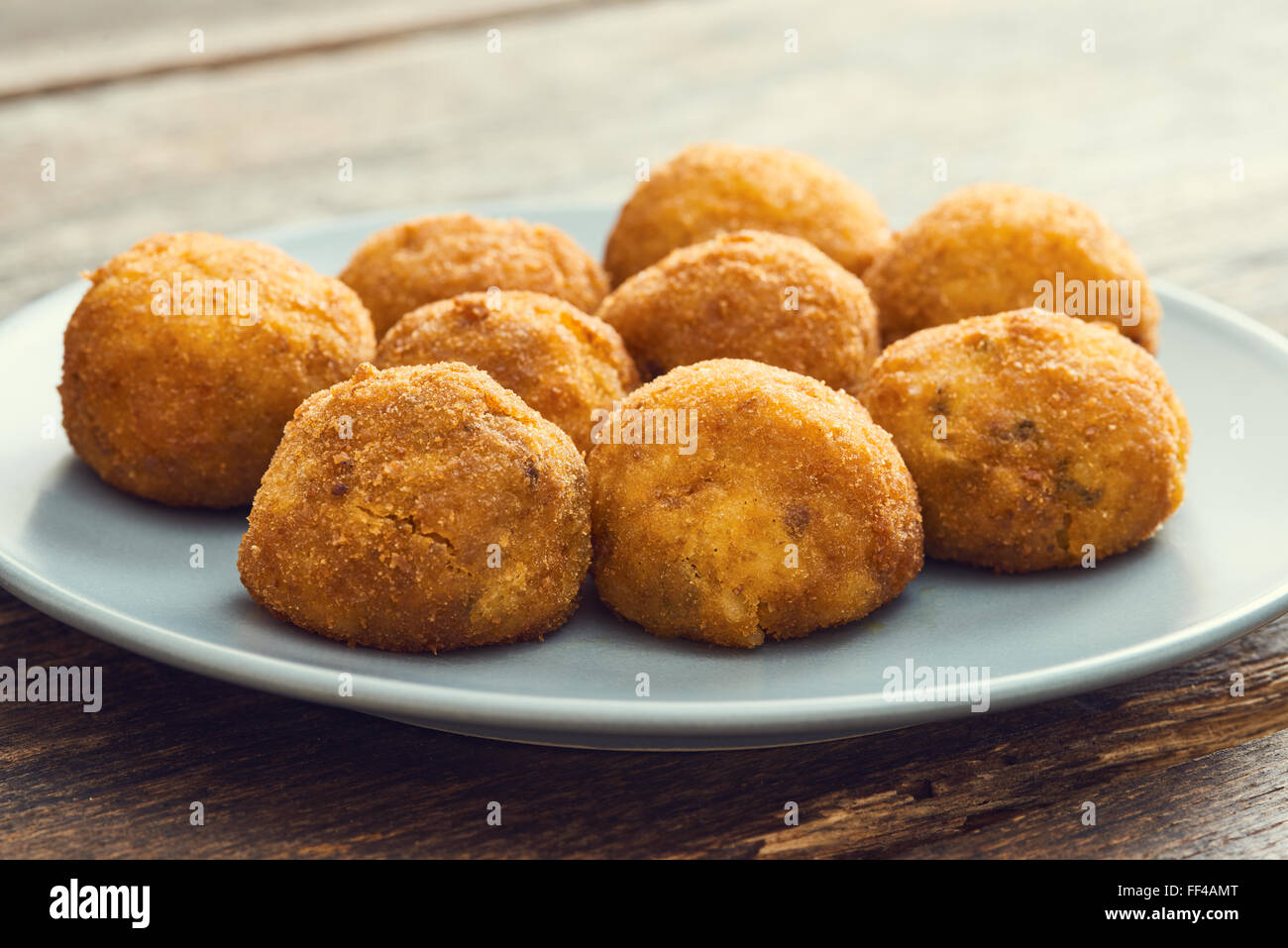Arancini sicilian street food - rice balls stuffed with meat cooked ...