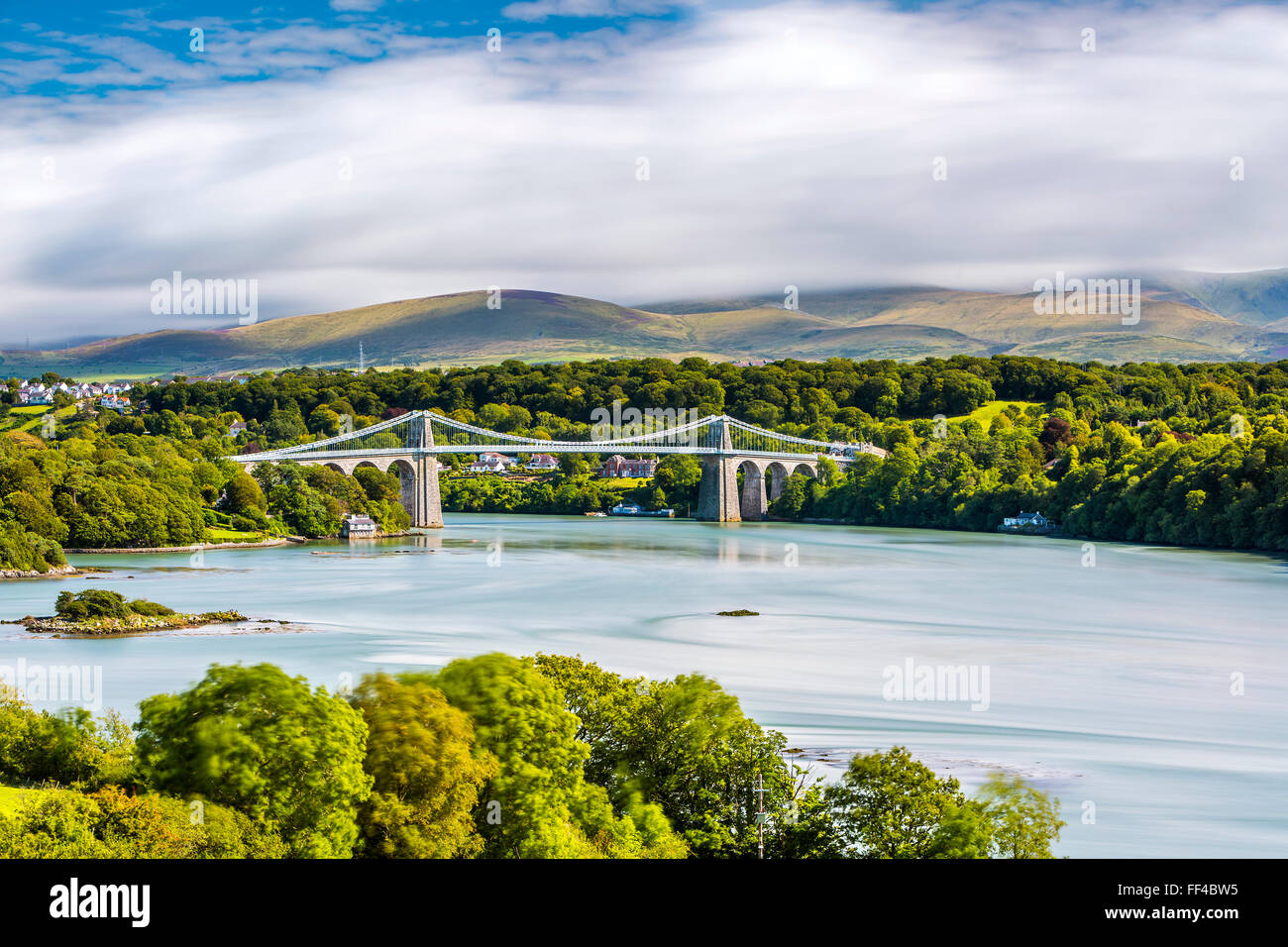 The Menai Suspension Bridge linking the island of Anglesey with ...