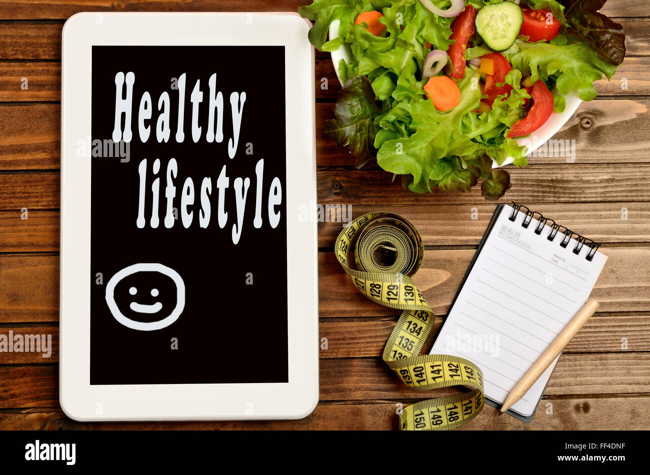 Healthy lifestyle words on digital tablet Stock Photo - Alamy