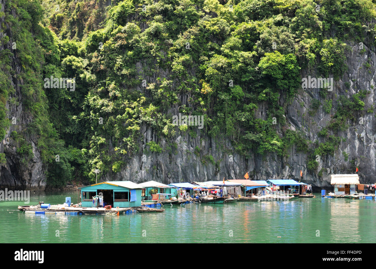 Floating fishing village in the Gulf of Tonkin at Halong Bay, Vietnam ...