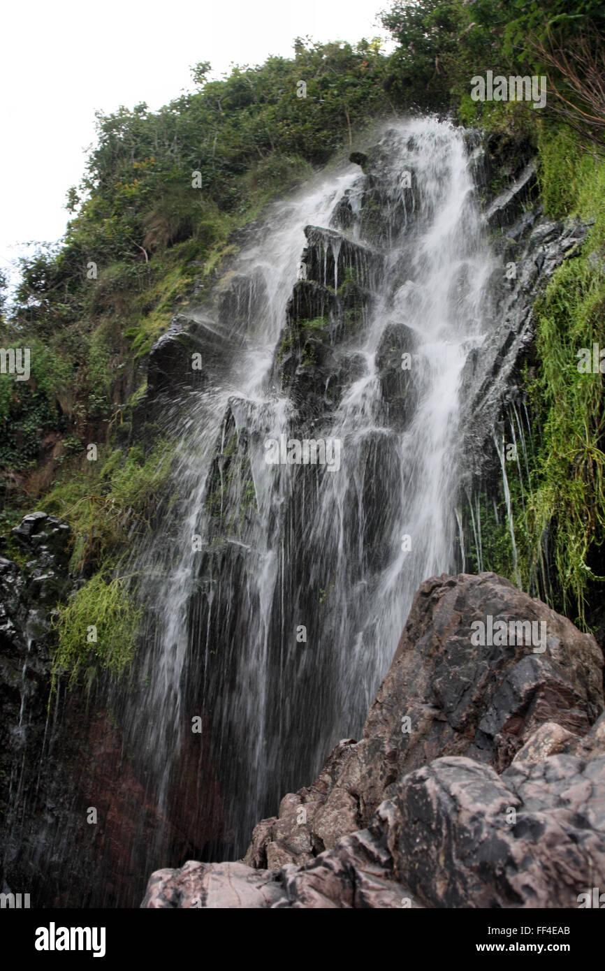 Waterfall on beach in Clovelly Devon Stock Photo - Alamy