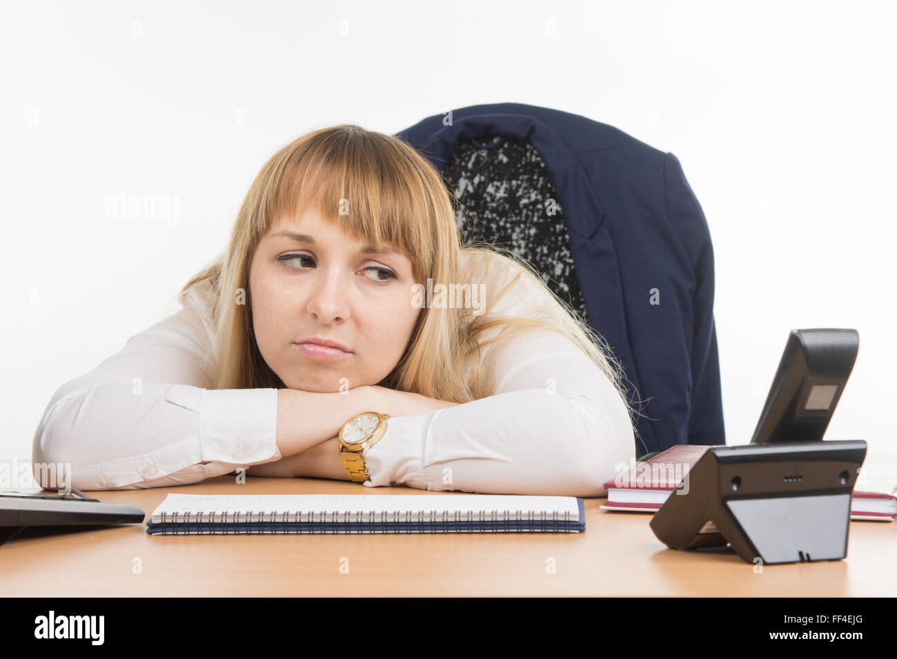 Office employee wearily and angrily looks at the phone rang Stock Photo ...