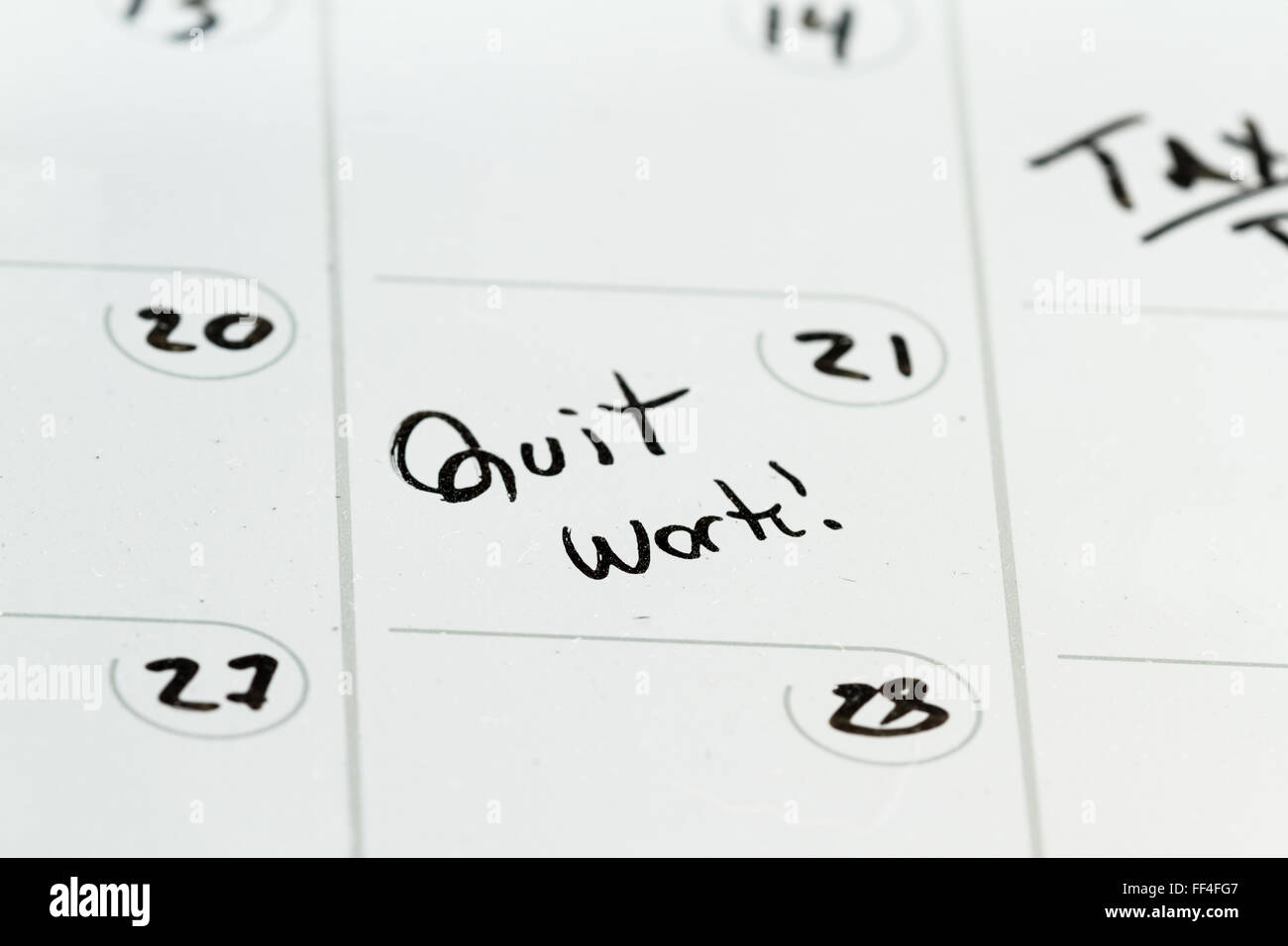 the words quit work hand written on a dry erase calendar as a concept ...