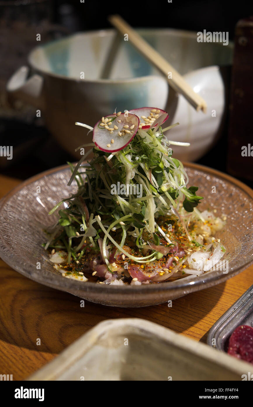 A serving of raw chicken (chicken sashimi) at Yakitori Akira restaurant ...
