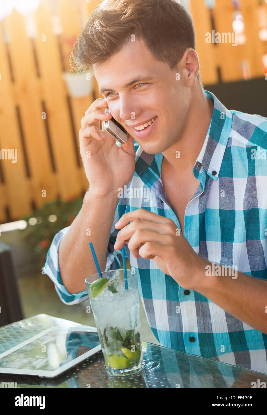 Man sitting in cafe Stock Photo - Alamy
