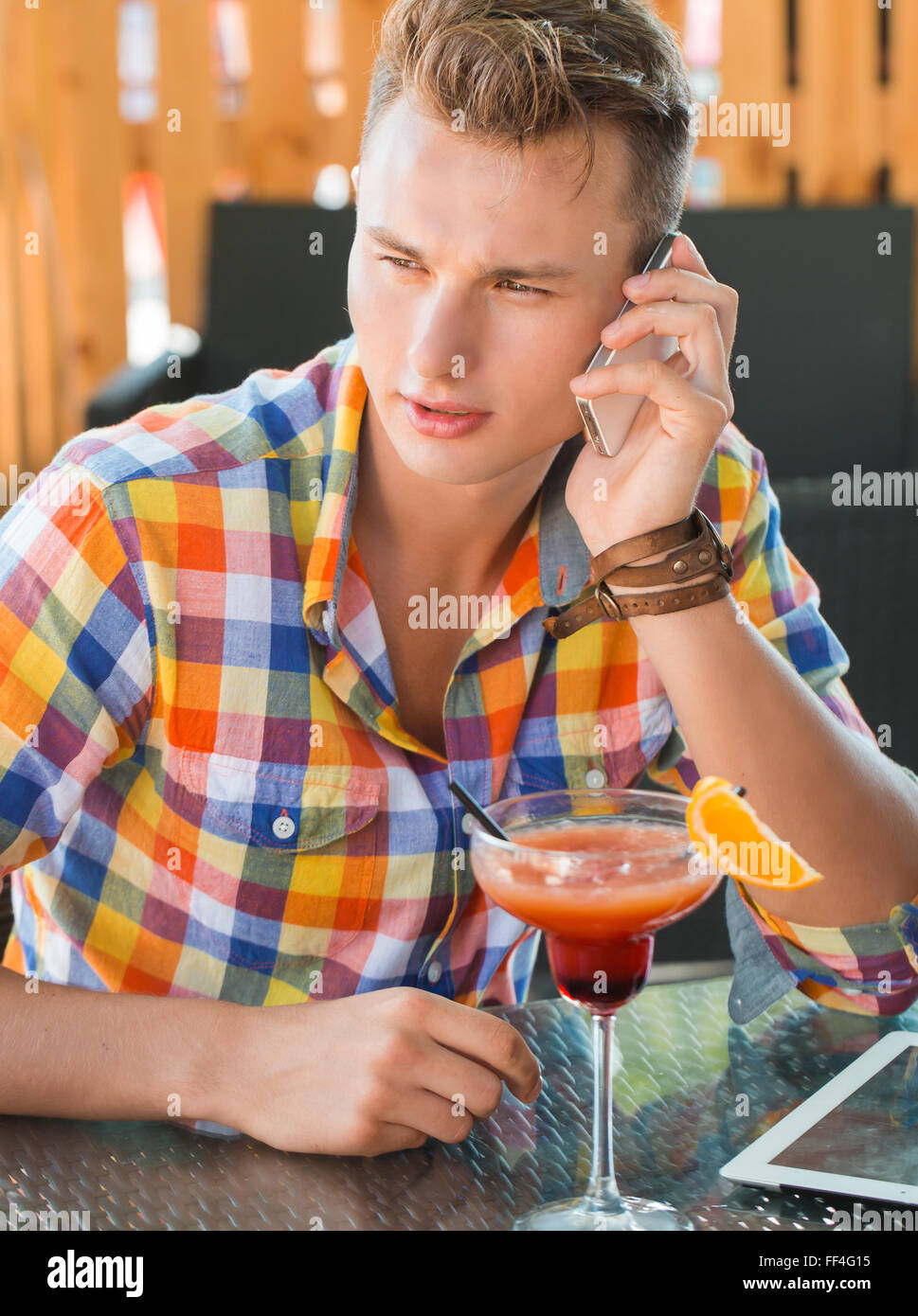 Man sitting in cafe Stock Photo - Alamy