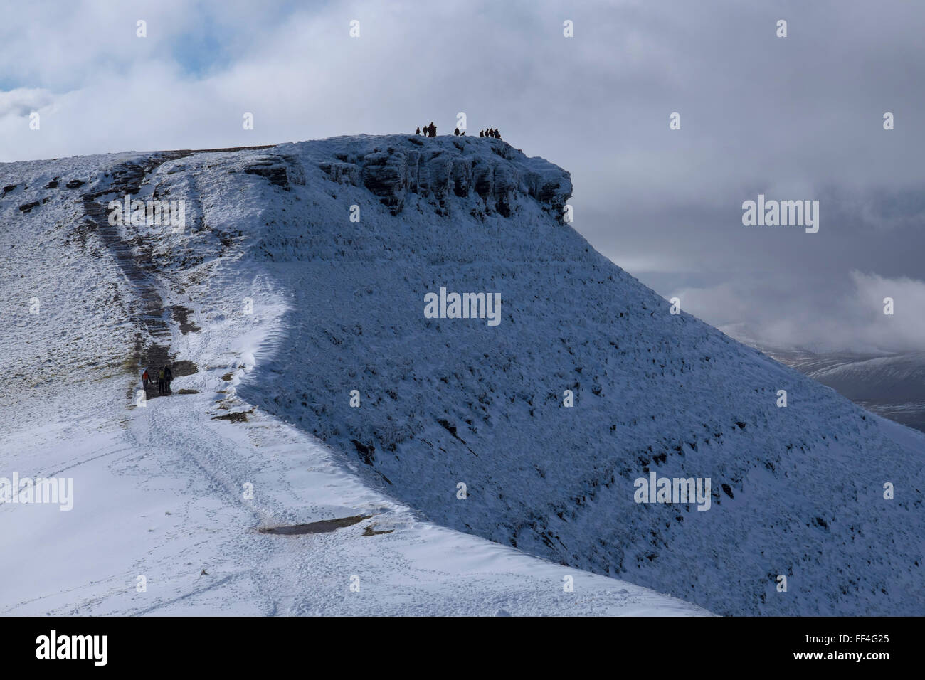 The summit of pen y fan in winter snow hi-res stock photography and ...