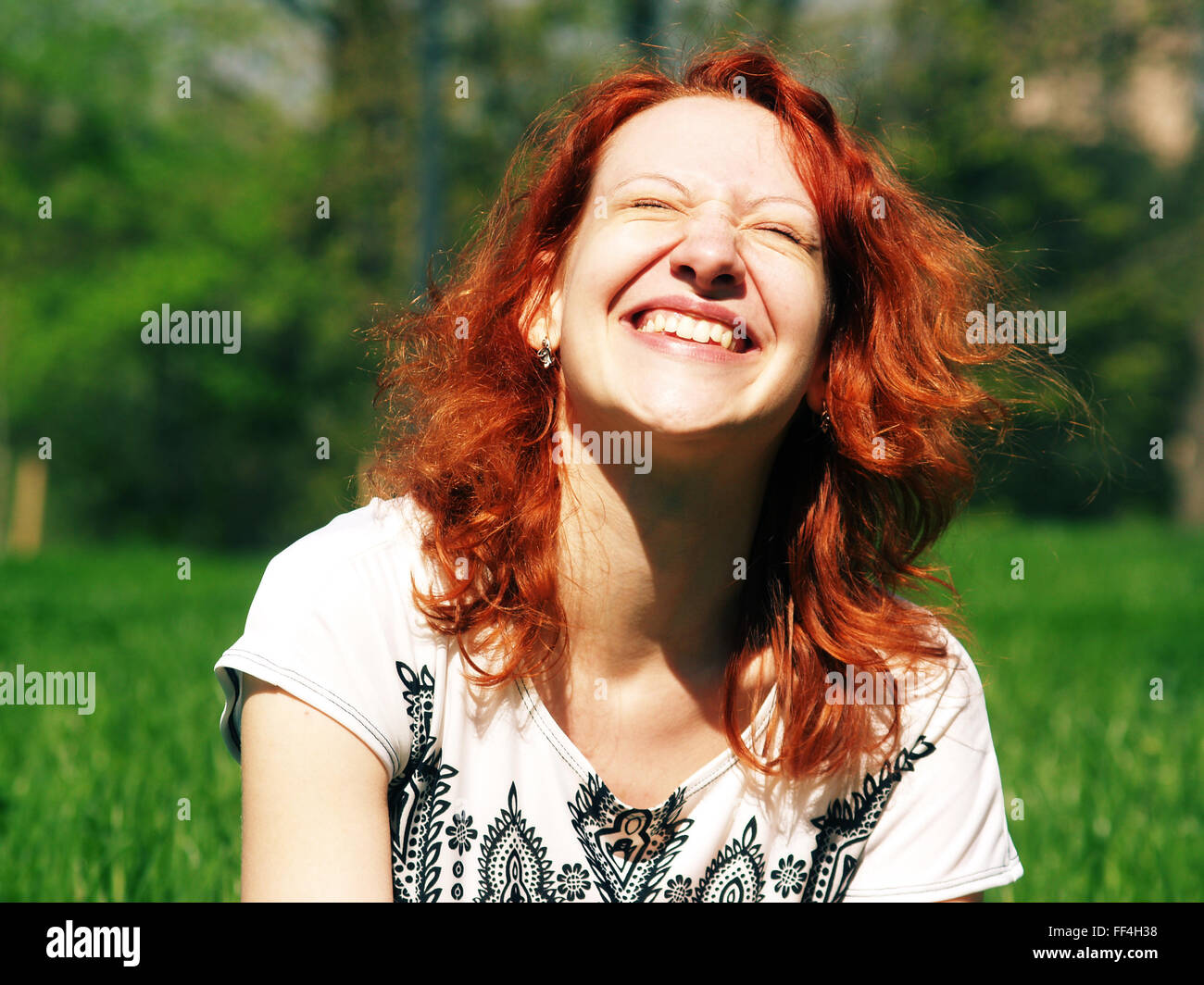 portrait of a laughing girl In sunshine Stock Photo - Alamy