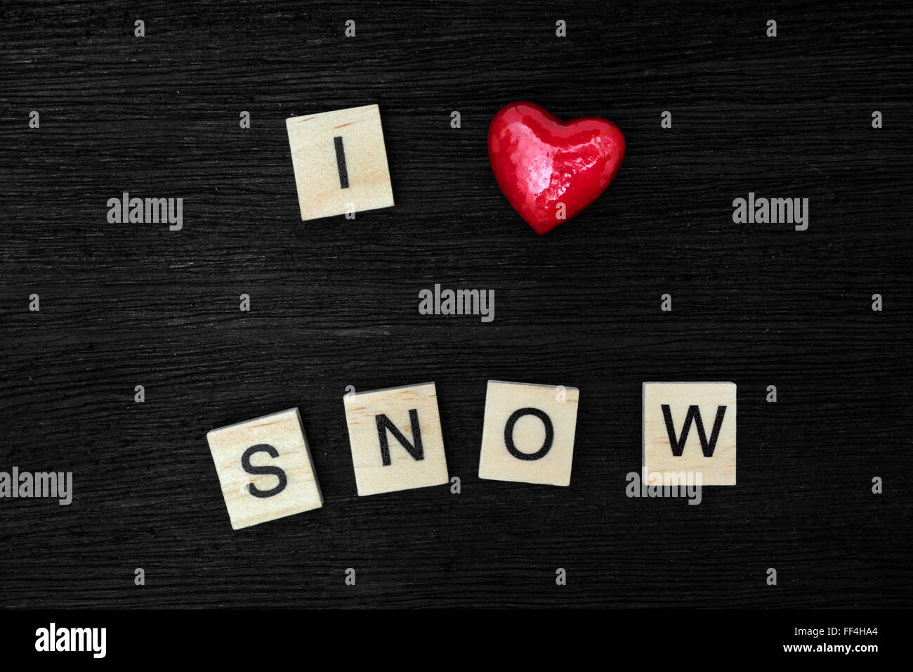 I love snow concept on black background Stock Photo - Alamy