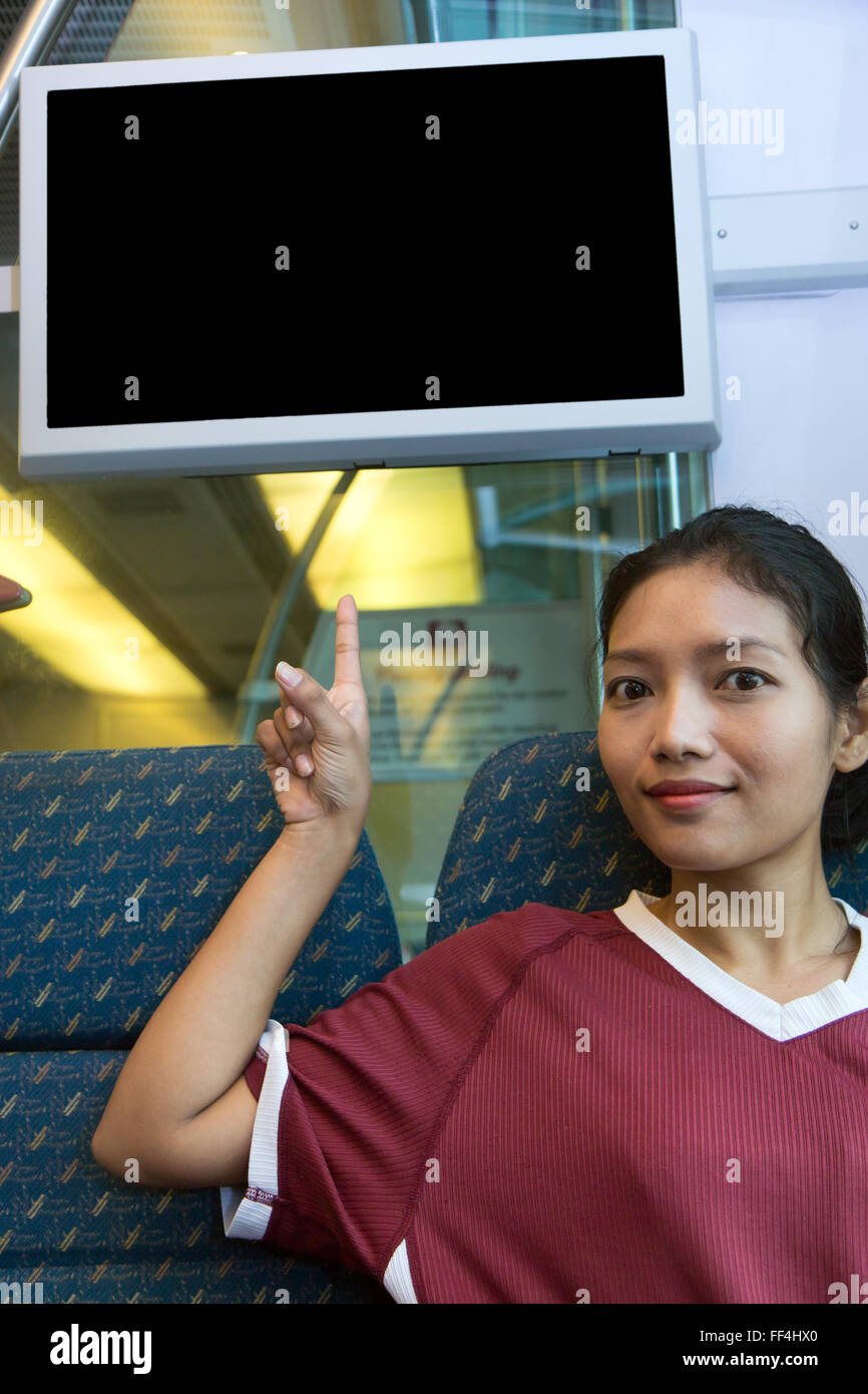 woman on the train shows up on the display Stock Photo - Alamy