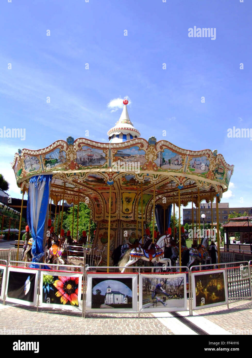 Carousel in Iasi Romania in the summer with blue sky behind Stock Photo ...