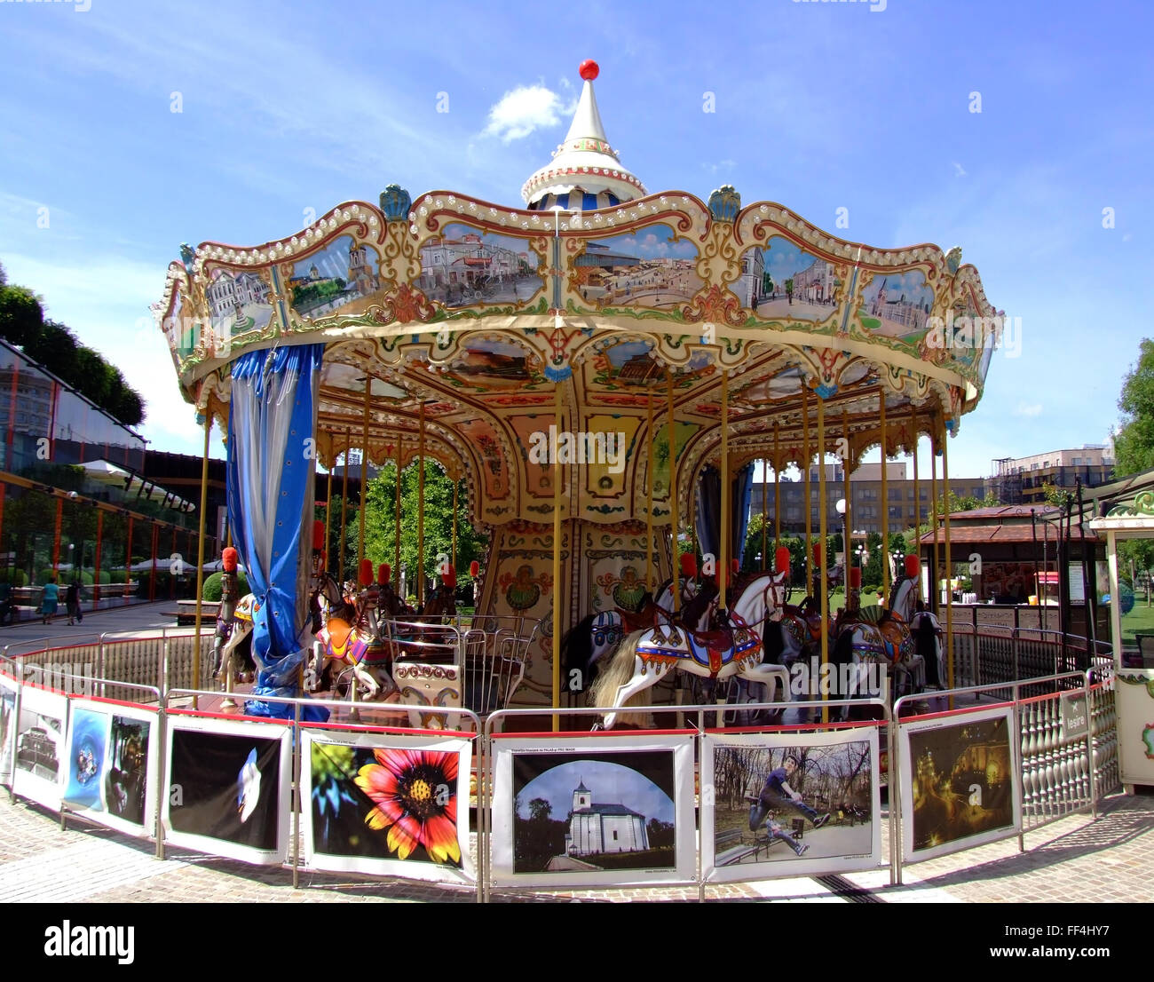 Carousel in Iasi Romania in the summer with blue sky behind Stock Photo ...