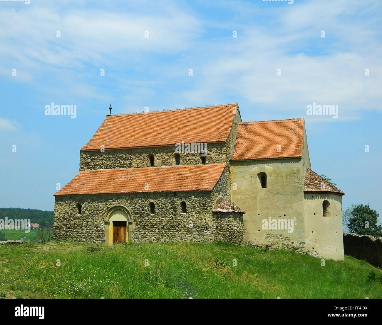 Rural stone house with blue sky behind Stock Photo - Alamy