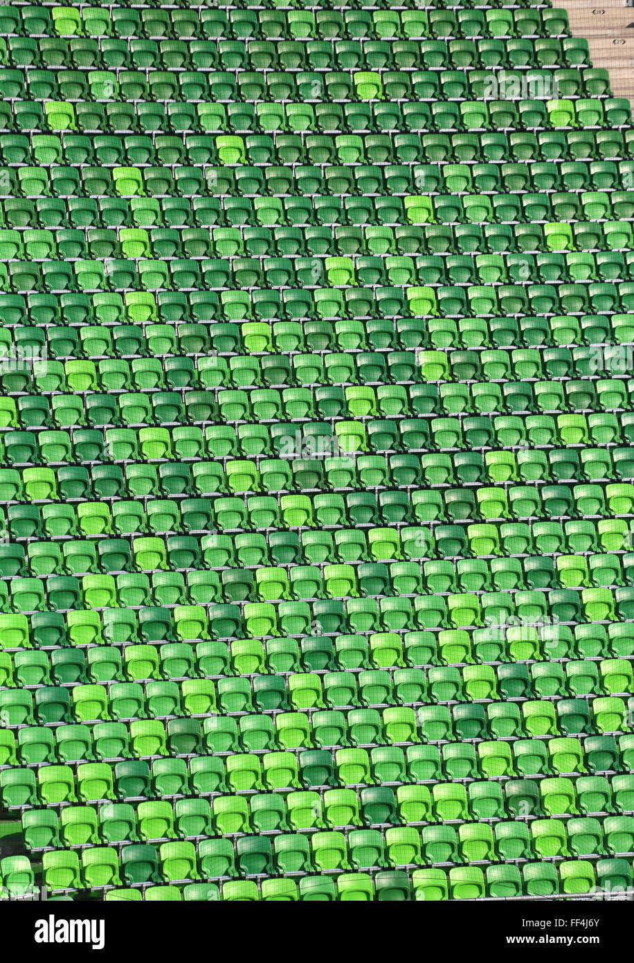 Green colored seats in row in a soccer stadium Stock Photo - Alamy