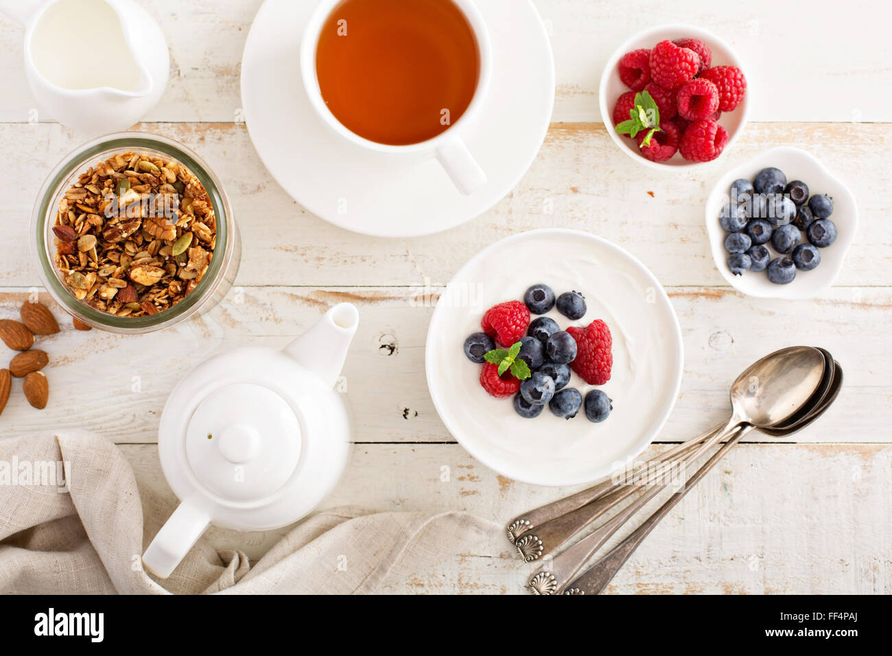 Natural yogurt in a bowl with berries Stock Photo - Alamy