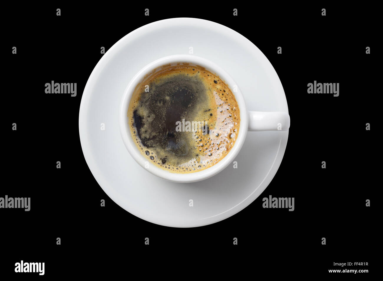 Single cup of coffee top view with plate isolated on empty black ...