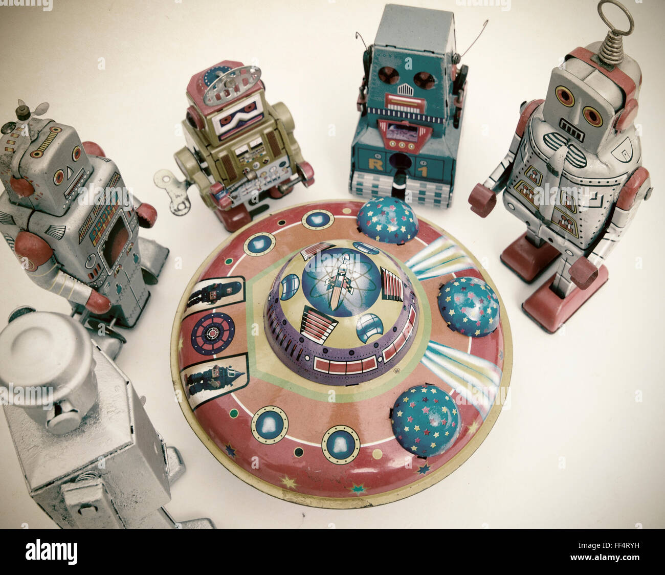 robots gather round UFO Stock Photo - Alamy