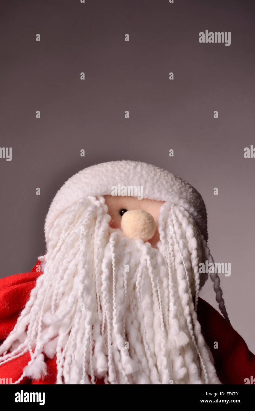Portrait of funny Santa on a dark background Stock Photo - Alamy