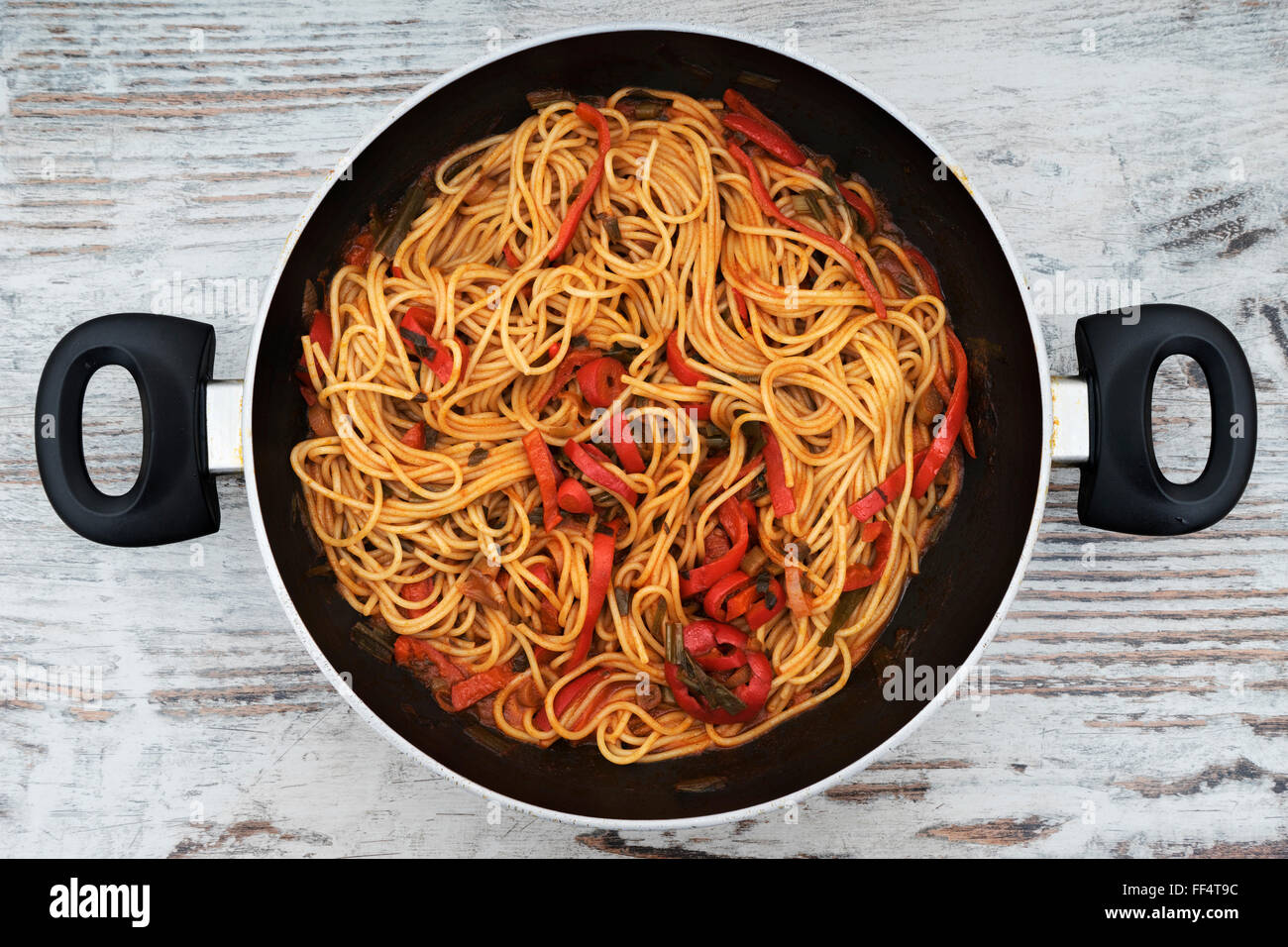 Homemade Spaghetti on pan, on wooden background Stock Photo - Alamy