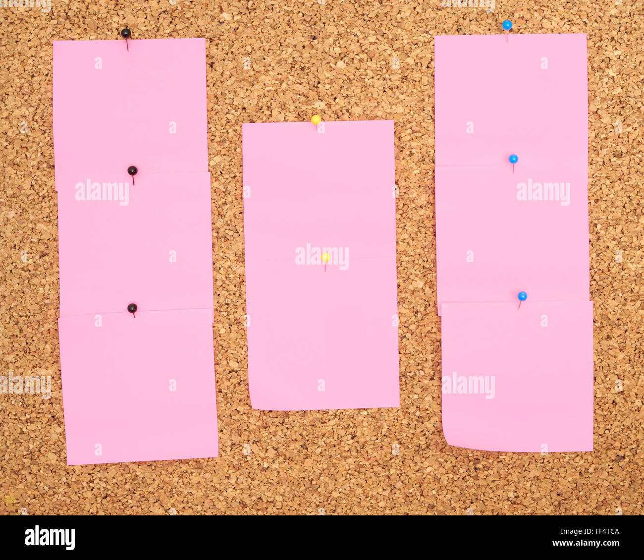 Pink sticker notes over cork board background Stock Photo - Alamy
