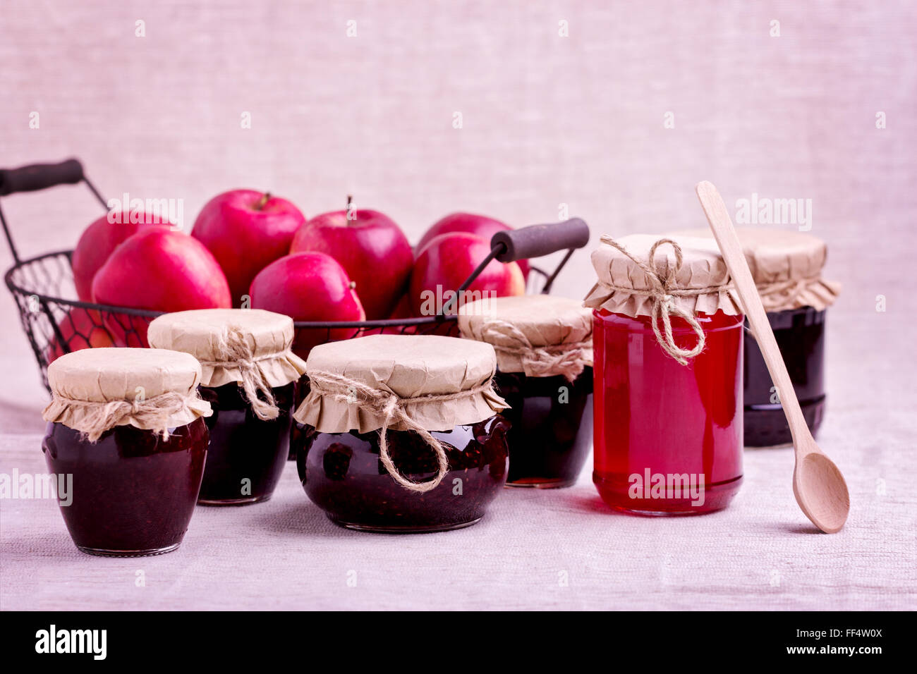 Preserved homemade fruits and berries jam in the jar. Rustic style ...