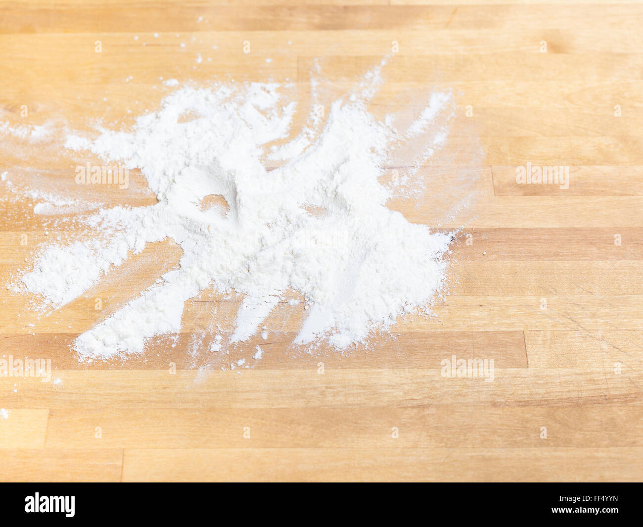 handful of wheat flour on wooden table for kneading of dough Stock ...