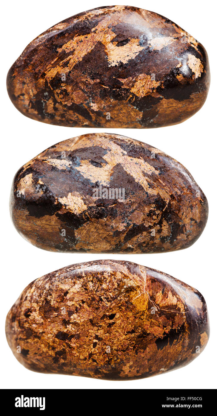 macro shooting of natural mineral stone - three tumbled Bronzite ...