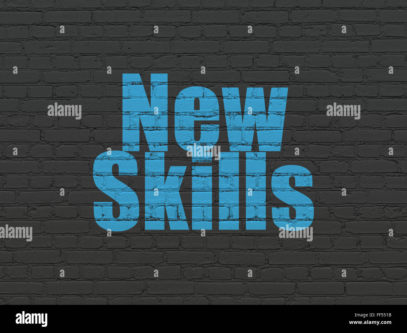 Learning concept: New Skills on wall background Stock Photo - Alamy