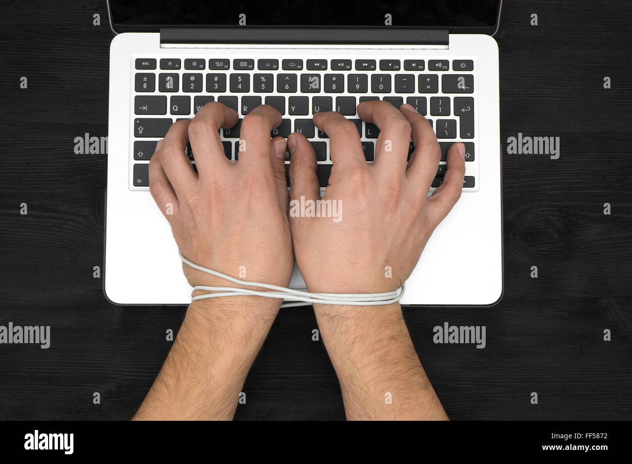 Hands of man addicted to computer, internet slave and addict concept ...