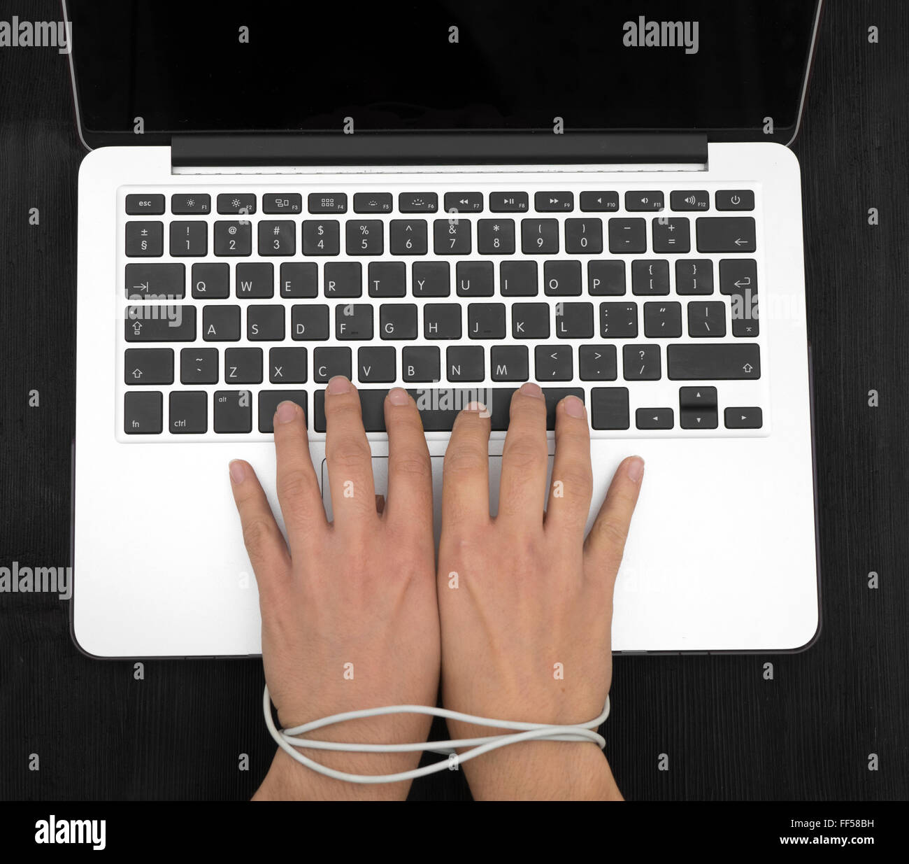 Hands of man addicted to computer, internet slave and addict concept ...