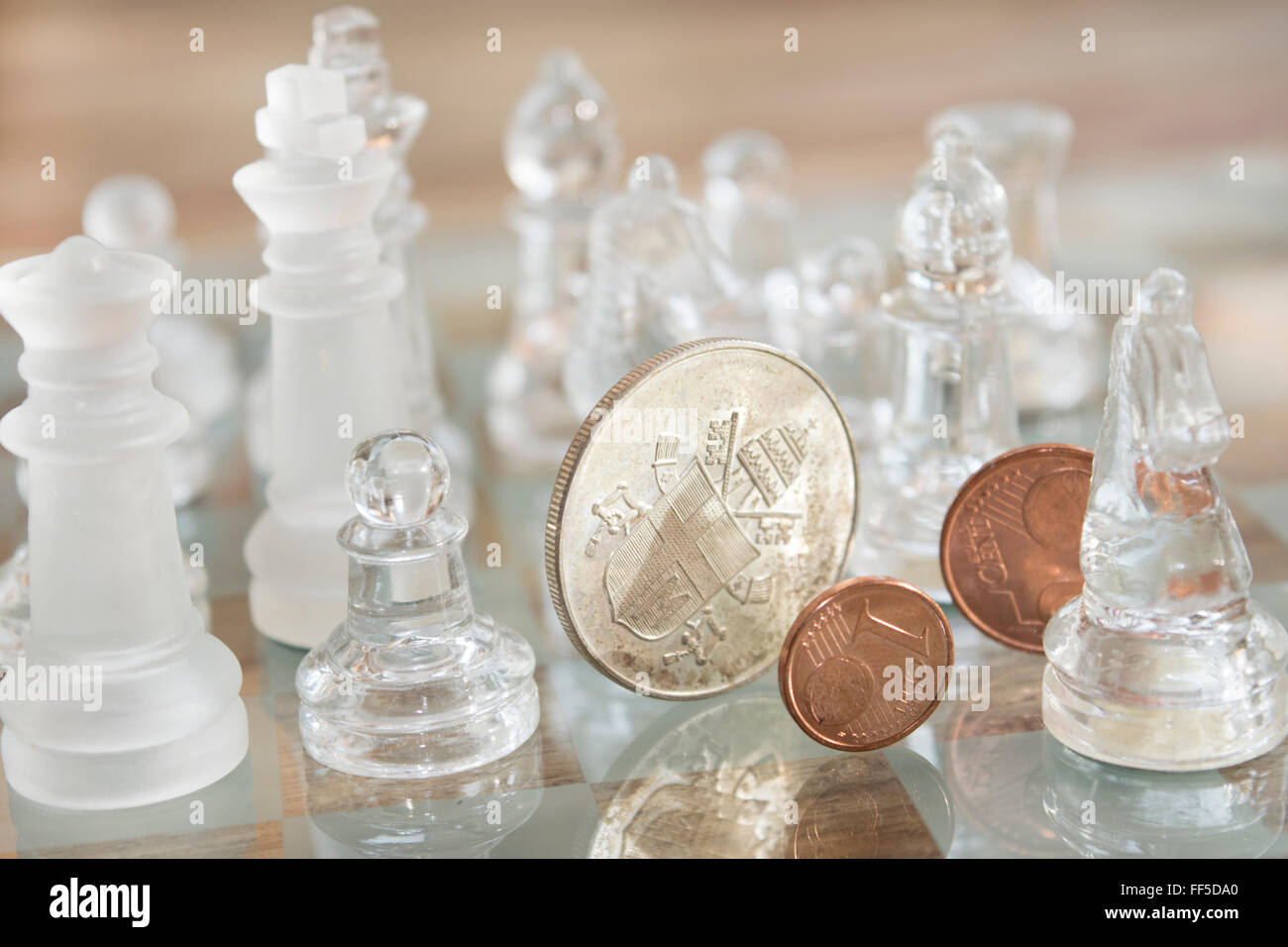 concept of economy as chess match with a chessboard and a money Stock ...