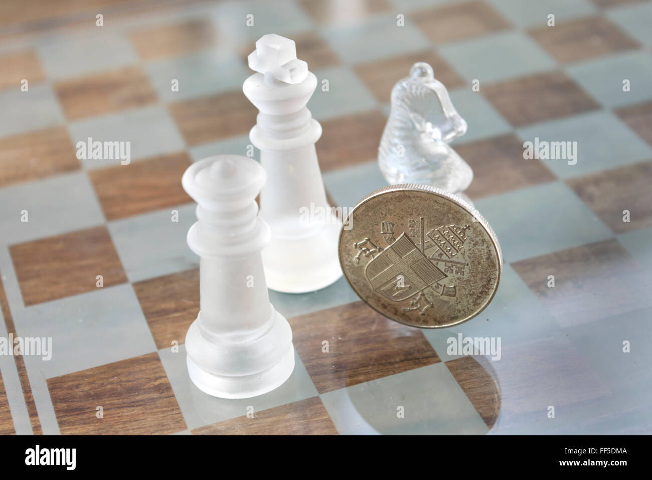concept of economy as chess match with a chessboard and a money Stock ...