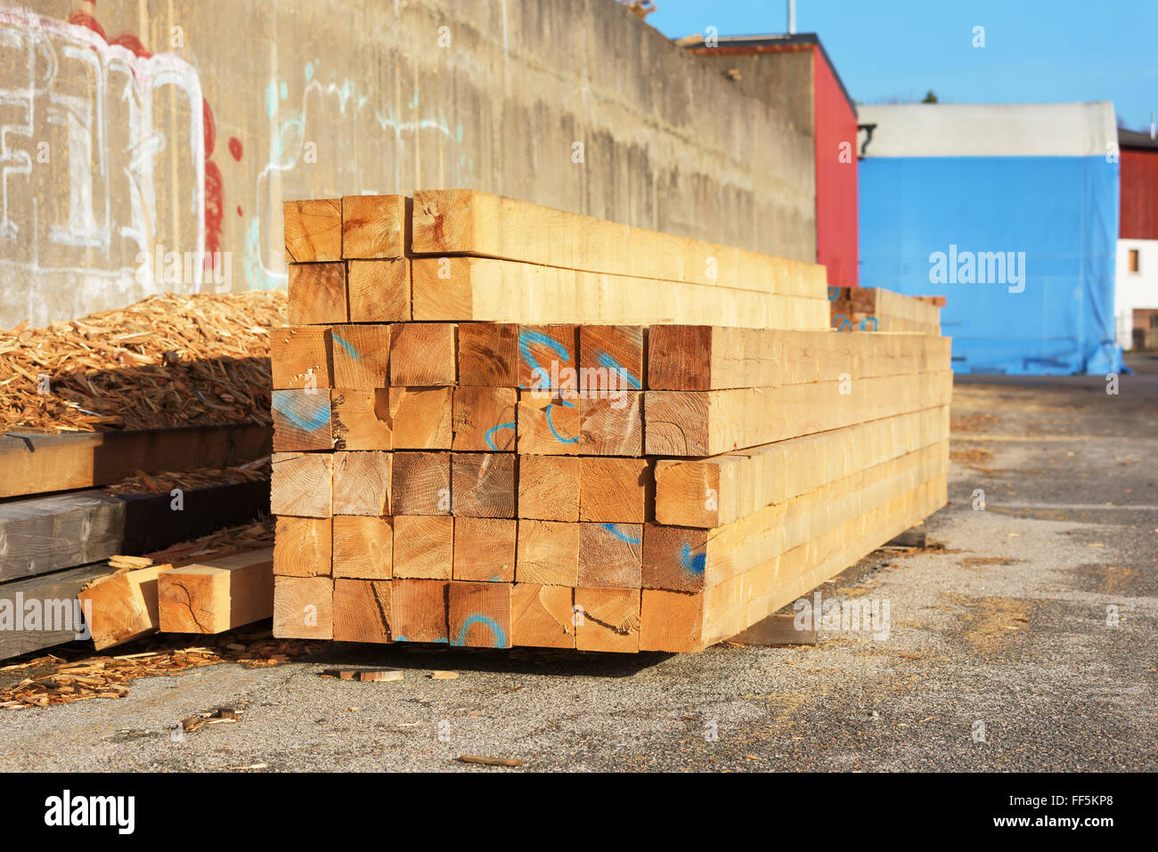 A stack of lumber in an industrial area Stock Photo - Alamy