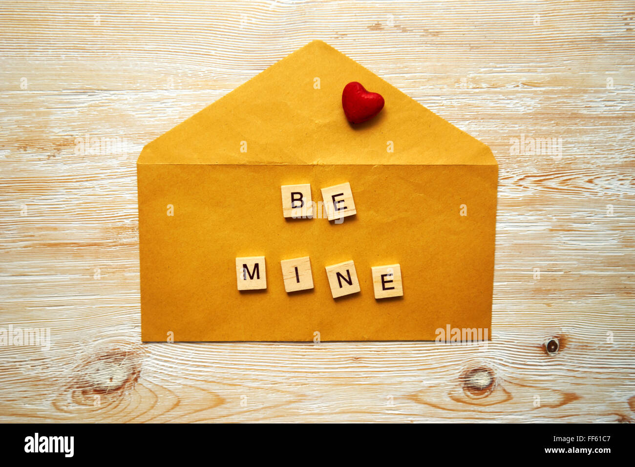Wooden letters spelling be mine Stock Photo - Alamy