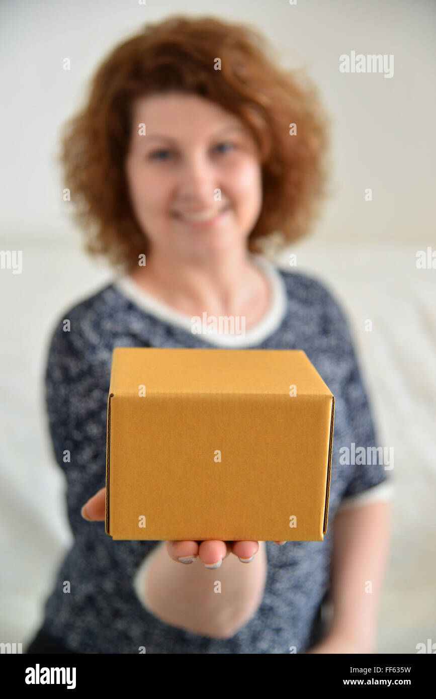 picture of attractive woman with cardboard box Stock Photo - Alamy