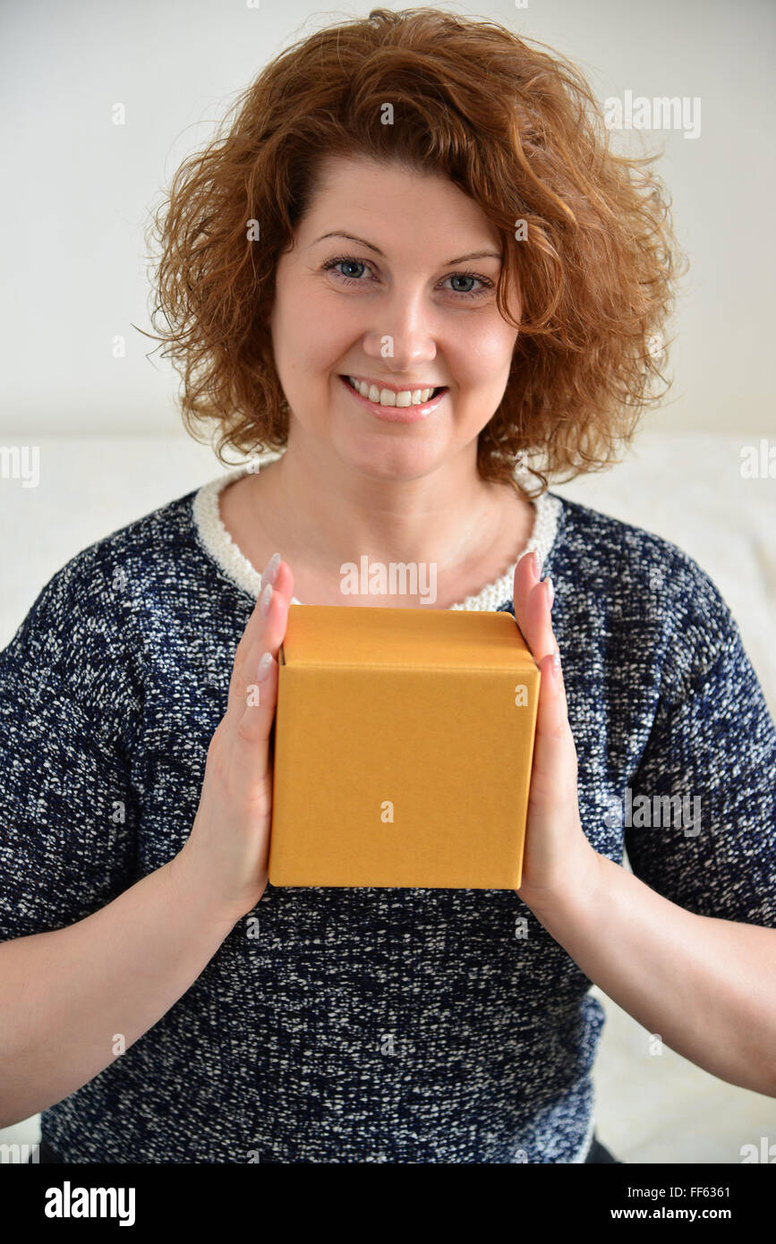 picture of attractive woman with cardboard box Stock Photo - Alamy