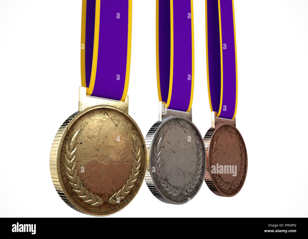 A set of blank gold, silver and bronze medals with ribbons on an ...