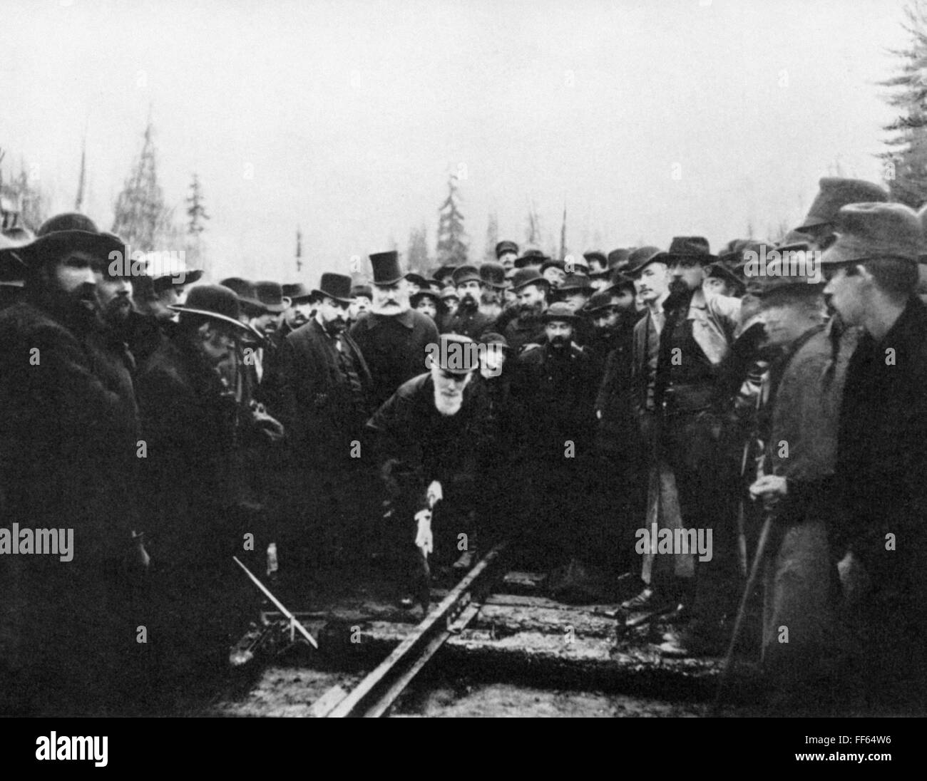 CANADA: RAILWAY, 1885./nDriving in the last spike of the Canadian ...