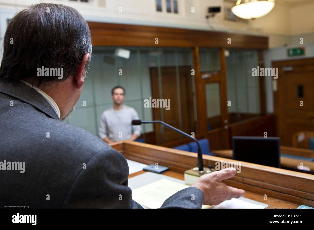 In a magistrates court in England, models pose as defendant and Judge ...