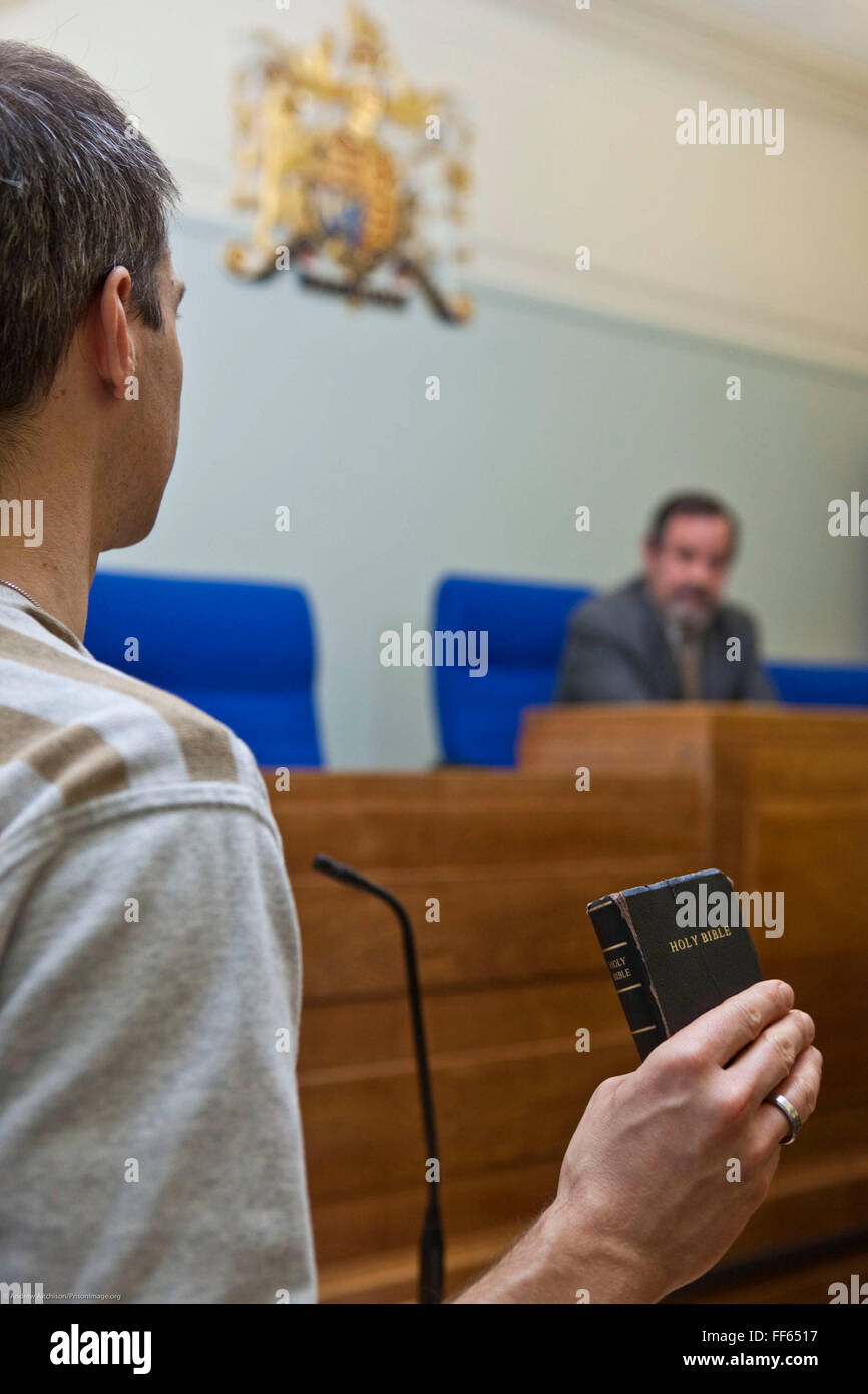 In a magistrates court in England, models pose as defendant and Judge ...