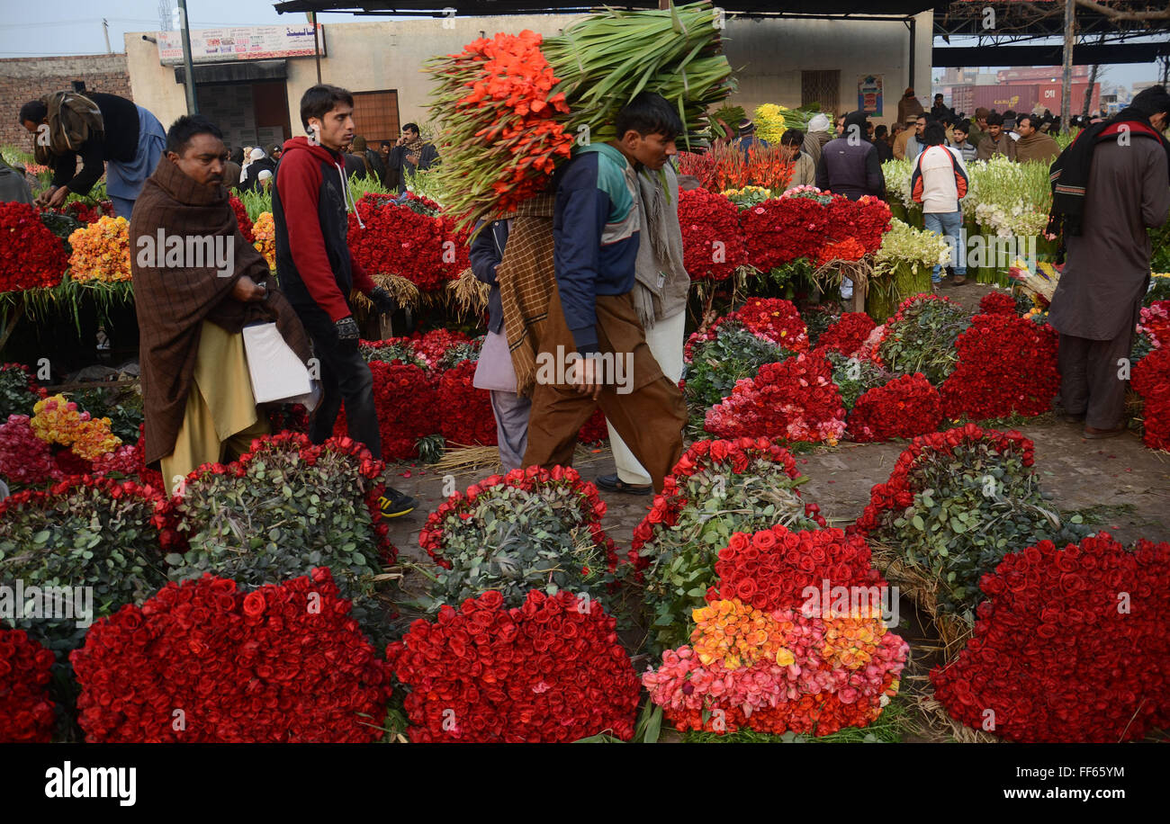 Lahore, Pakistan. 11th Feb, 2016. Pakistani flower vendor display fresh ...