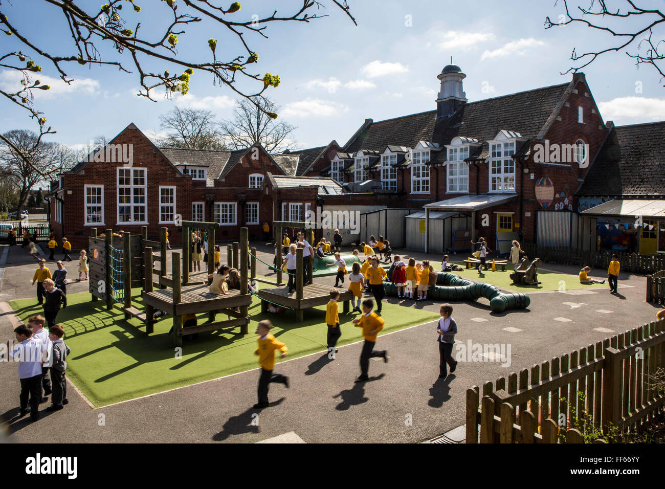Children enjoying their playtime outdoors in the playground of South ...