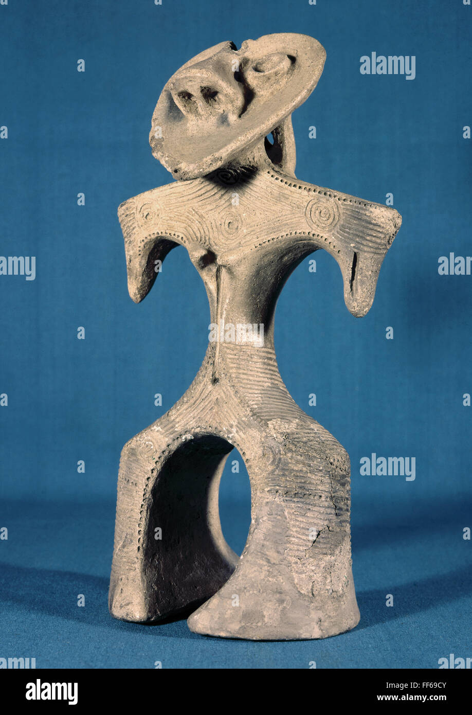 JAPAN: DOGU FIGURINE. /nFemale dogu figurine. Fired clay, Japanese ...