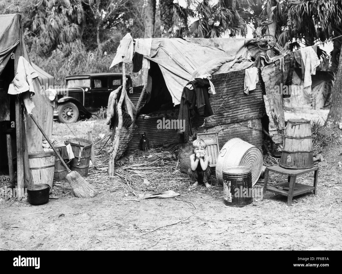 MIGRANT WORKER, 1939. /nA migrant worker's shack in a shanty town, near ...
