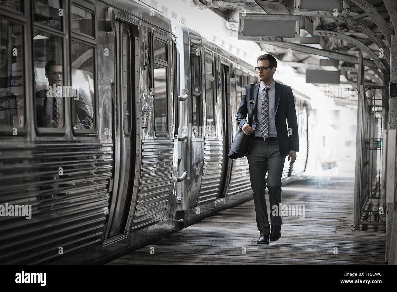 Commuter on train platform hi-res stock photography and images - Alamy